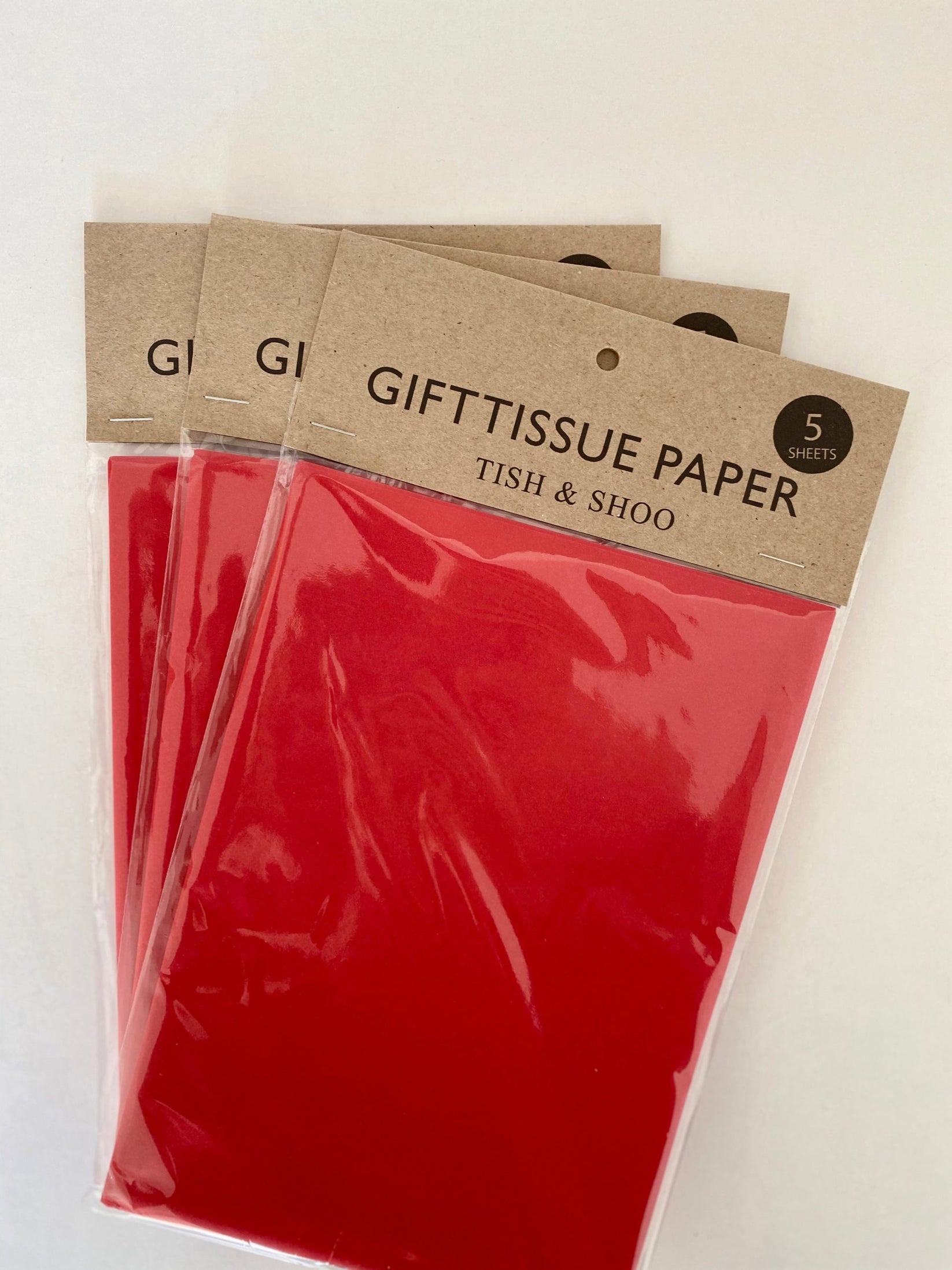 Red Tissue Paper – In The Box